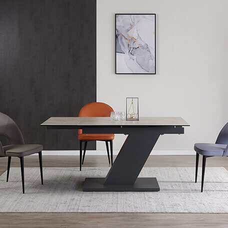 Oval extendable ceramic dining table with swivel extending mechanism